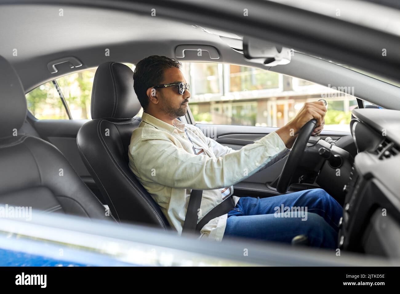 Man sitting in car indian hi-res stock photography and images - Alamy