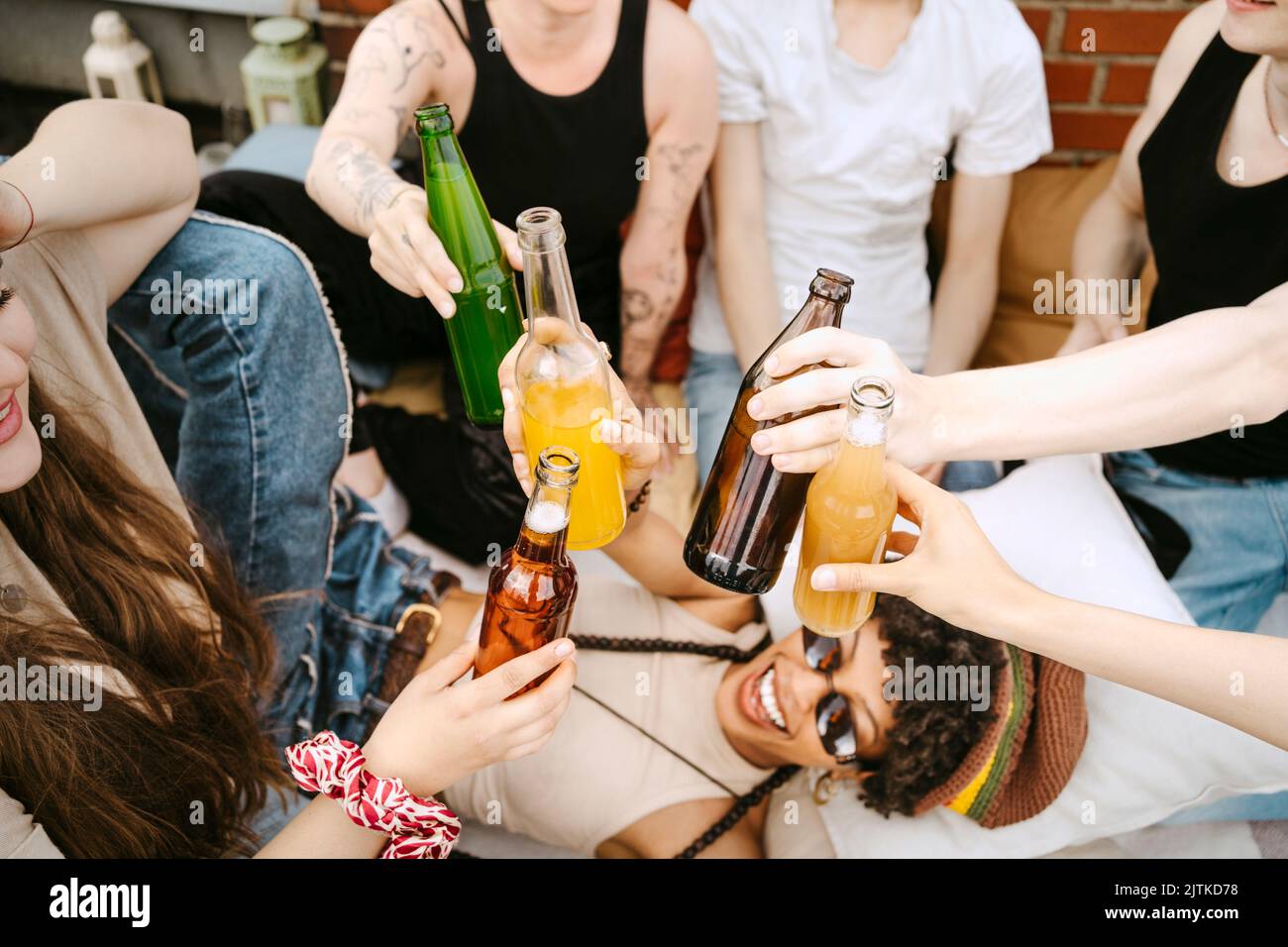 Young friends toasting rooftop party hi-res stock photography and ...