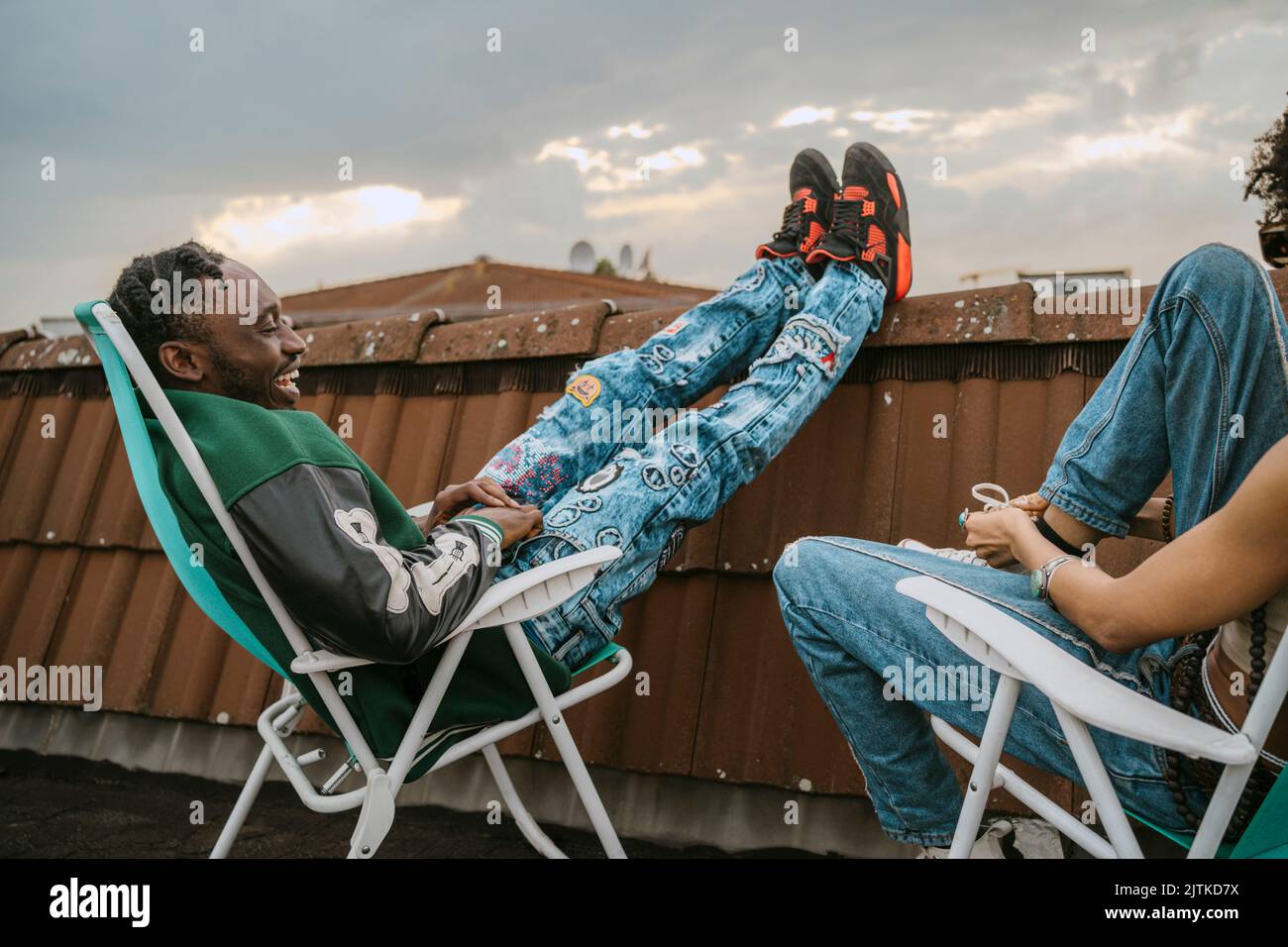 Man sitting on chair social hi-res stock photography and images - Alamy