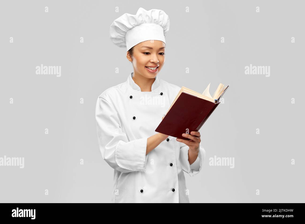 Woman book chef hat hi-res stock photography and images - Alamy