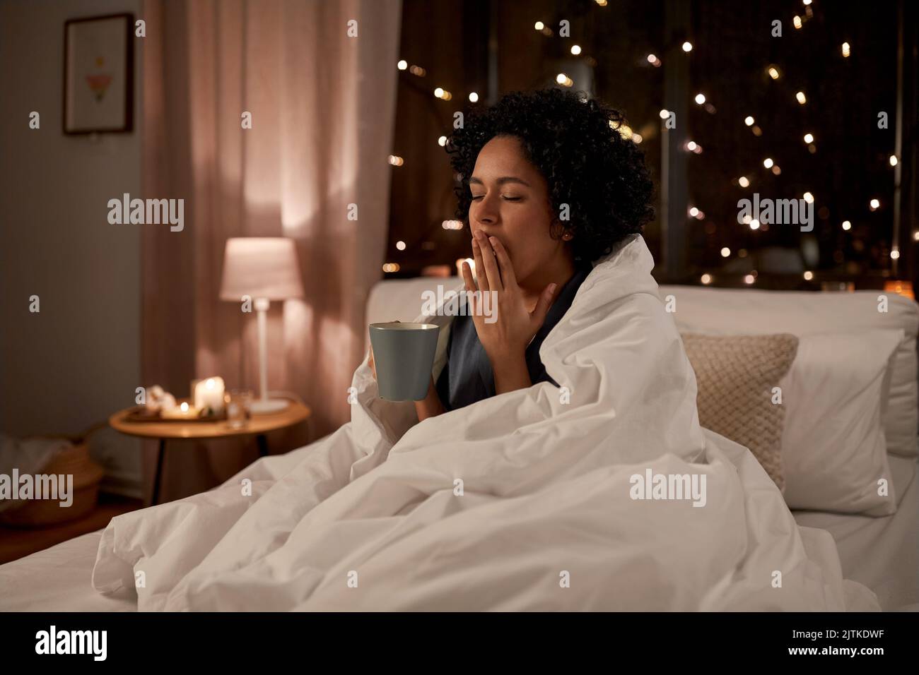 Tired woman coffee bed hi-res stock photography and images - Alamy