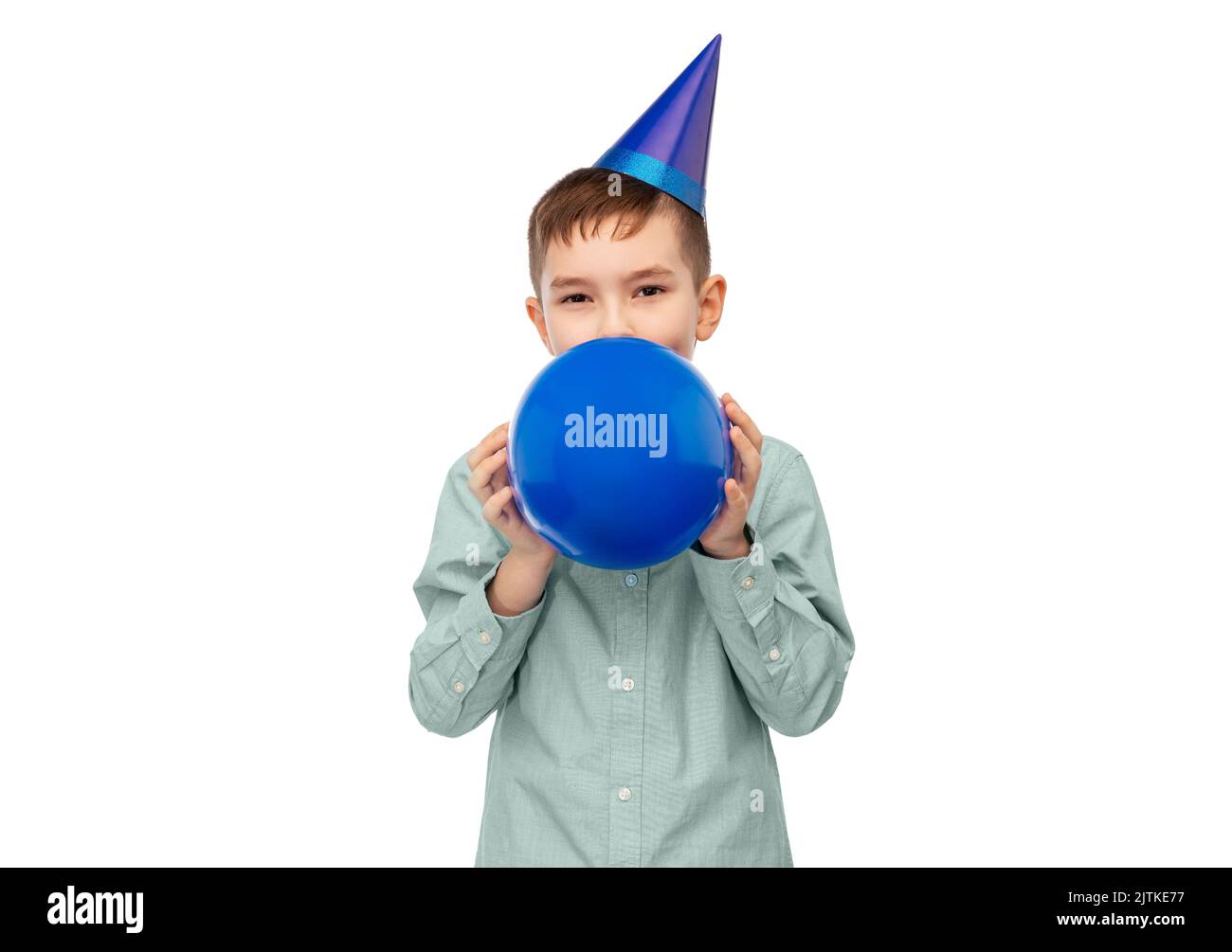Boy blowing balloon hi-res stock photography and images - Alamy