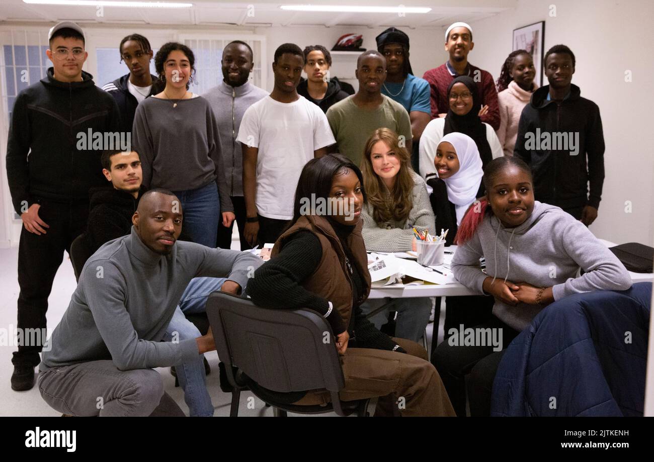 Portrait of teachers and multiracial students in classroom Stock Photo ...