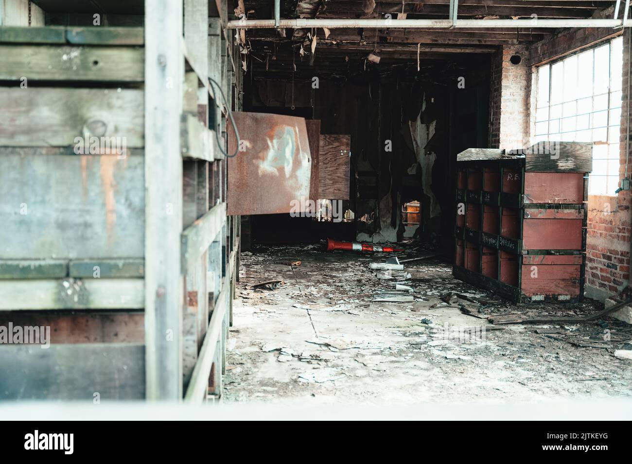 An old warehouse abandoned building interior with grunge shelves and ...