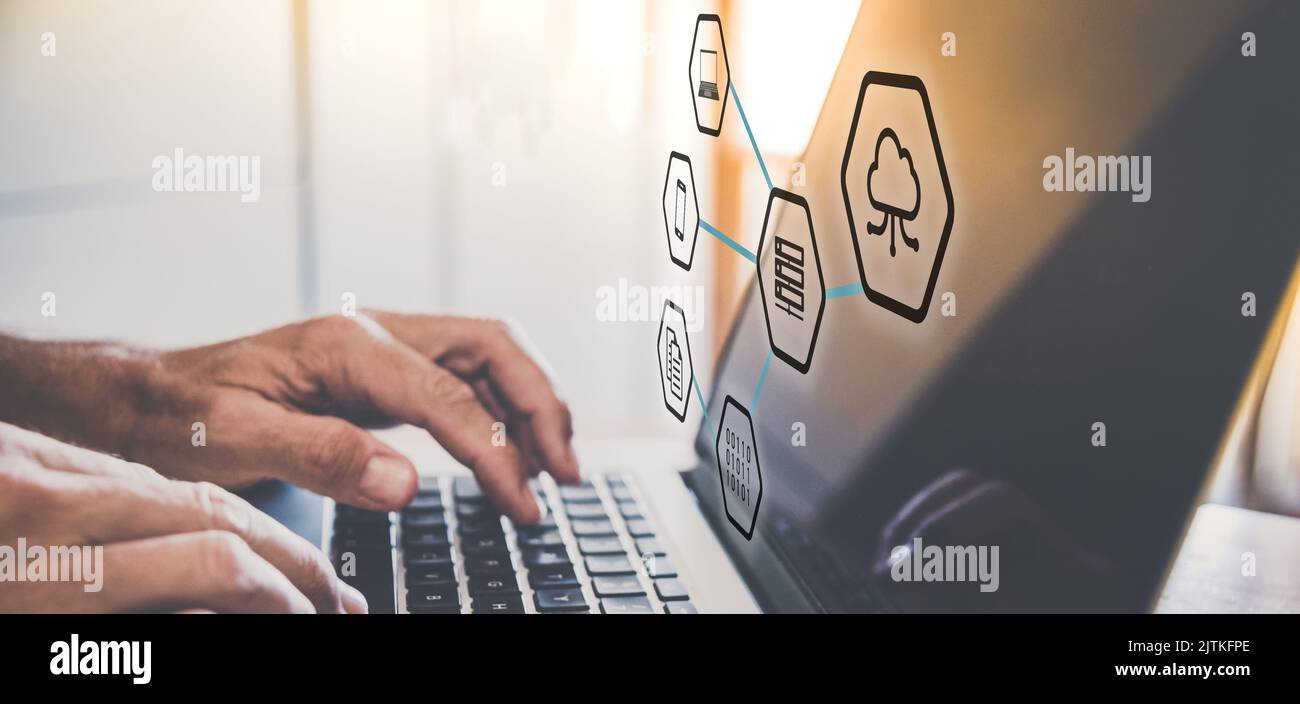 Hands typing on laptop keyboard. Business technology, cloud computing ...