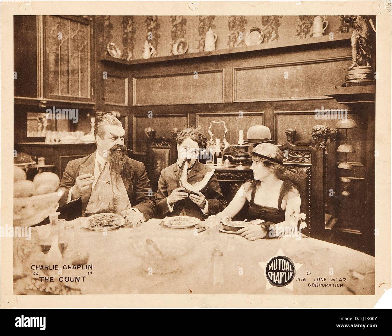 Charlie Chaplin - The Count - Vintage lobby card Stock Photo - Alamy