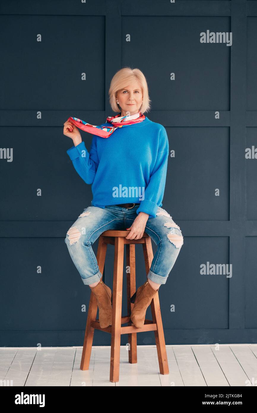 senior model woman beauty elegance confidence blue Stock Photo - Alamy