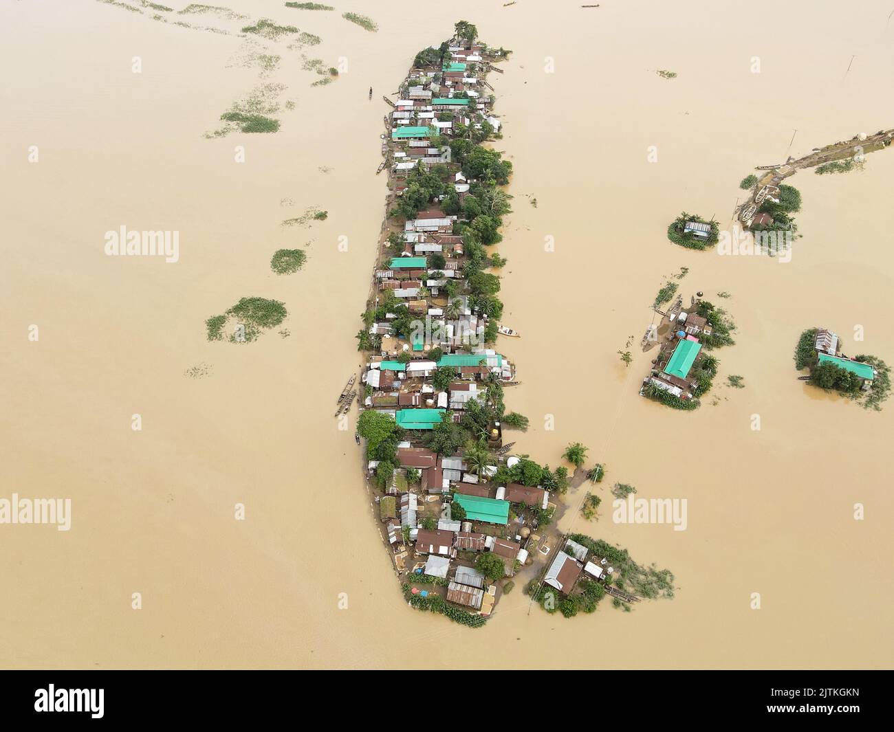 A damaged submerged area is seen after flash floods in Sunamganj ...