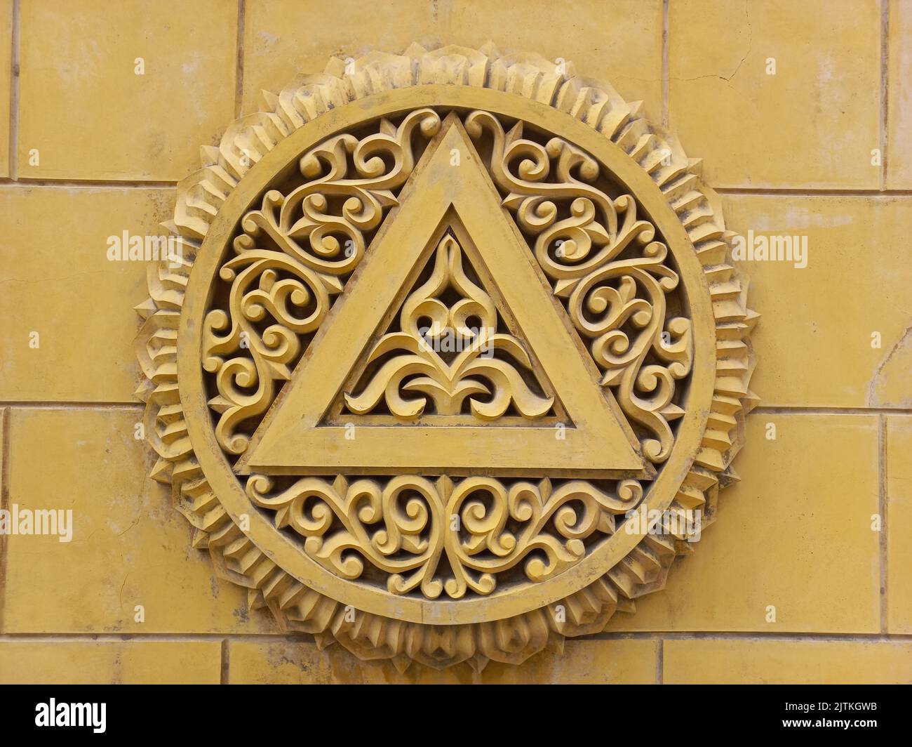 A Hindu Design Sculpture of a Triangle inside a Circle in the stone ...