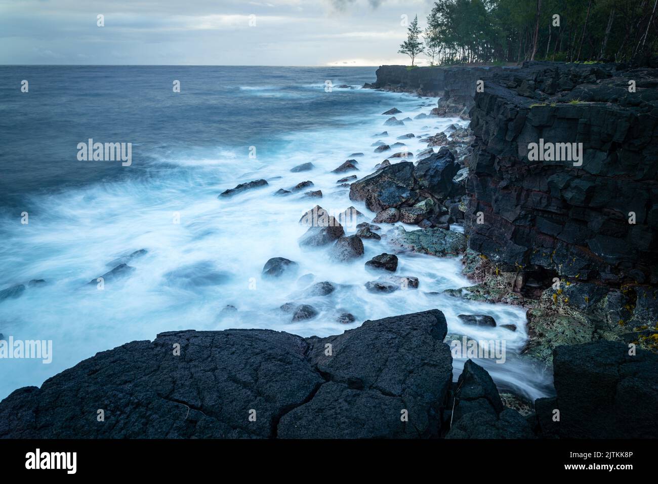 A rocky cliff overseeing the ocean view Stock Photo - Alamy
