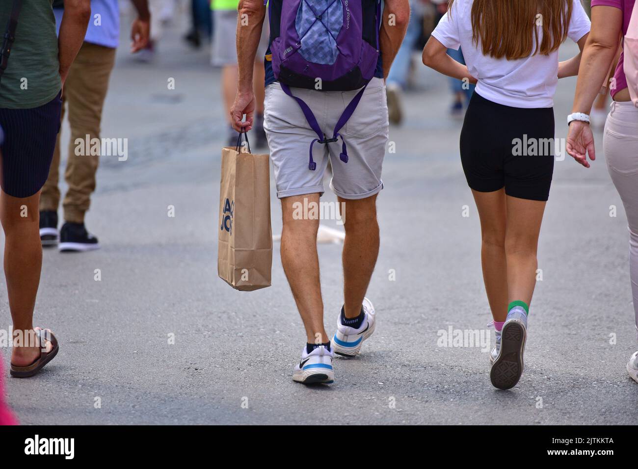 Street scene in the City of Munich with many busy people walking from ...