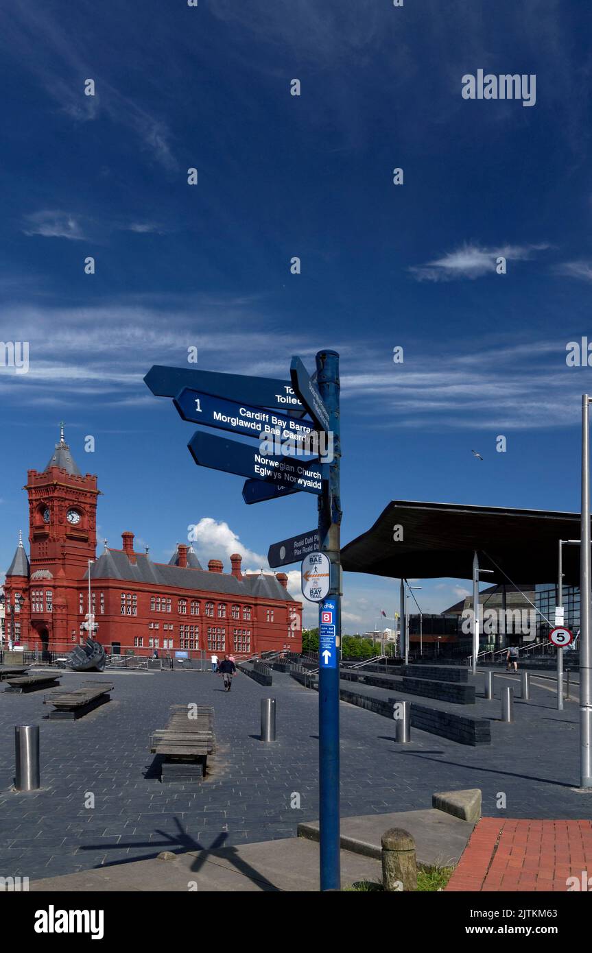 Signposts outside Welsh Assembly building. Senedd Cymru. and Pierhead ...