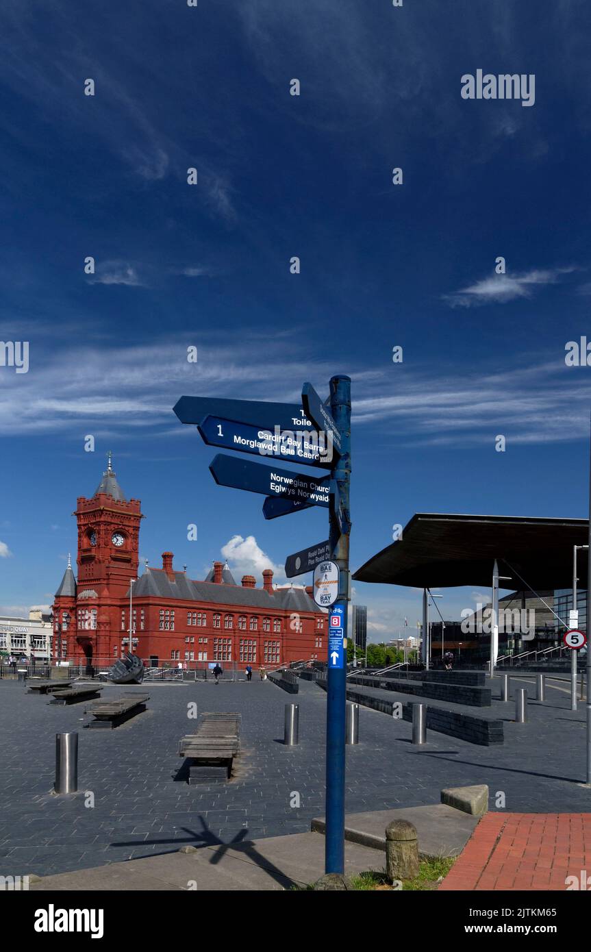 Signposts outside Welsh Assembly building. Senedd Cymru. and Pierhead ...