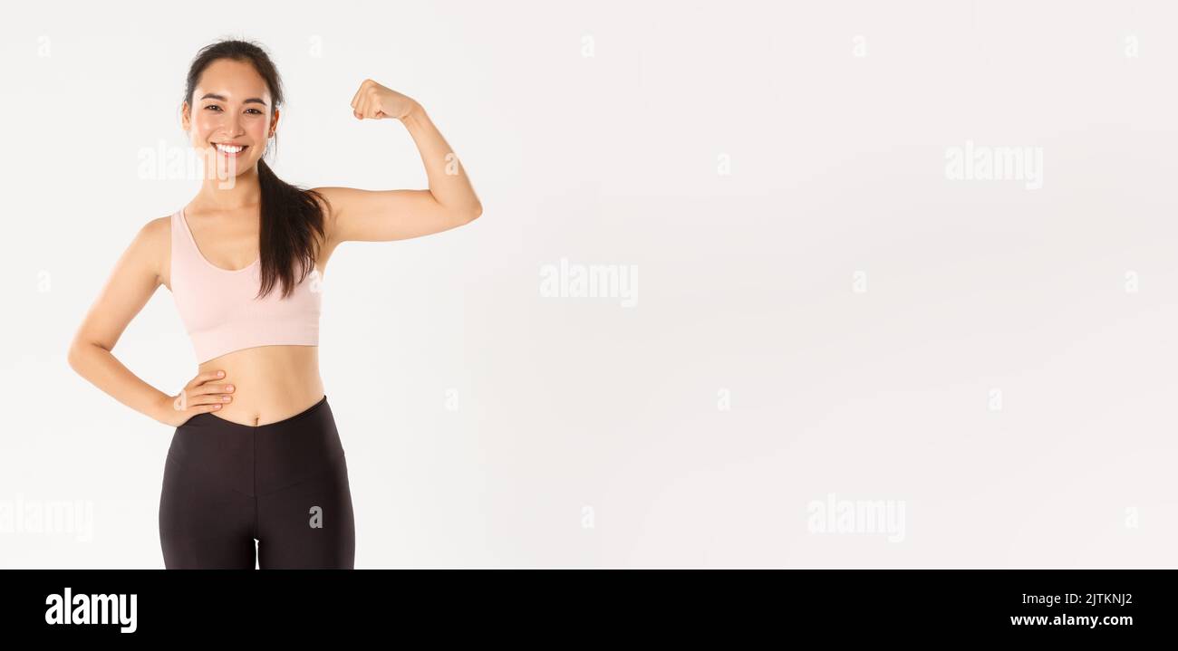 Sport, wellbeing and active lifestyle concept. Portrait of smiling slim ...