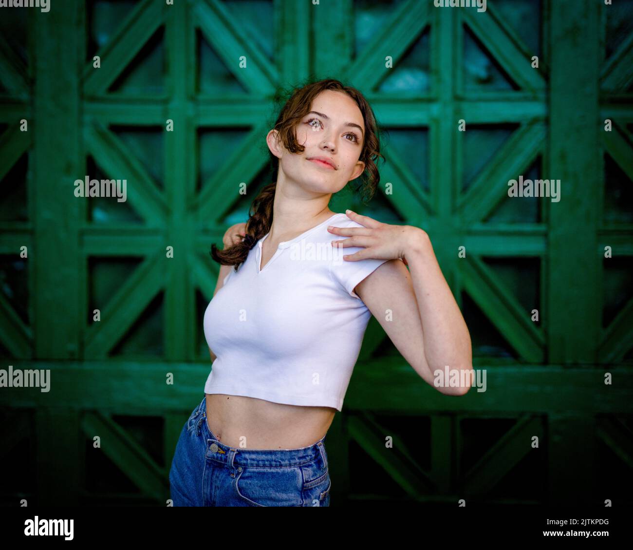 Fun Half Body Portrait of Young Woman Standing in Front of Large Ornate ...
