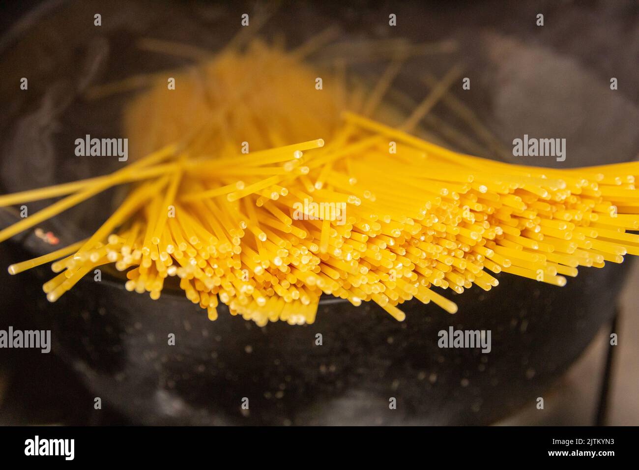 spaghetti pasta in a pan with water in Brazil Stock Photo - Alamy