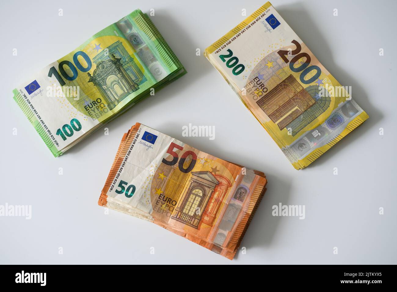 The Different Euro banknote stacks on the white background, close-up ...