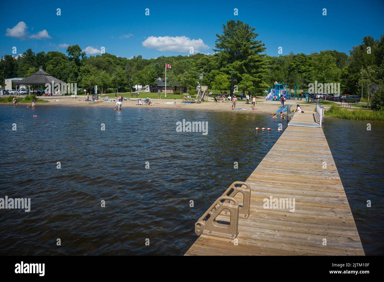 August 2021-Families enjoying the beach of Lake Rosseau, Muskoka in the province of Ontario ...
