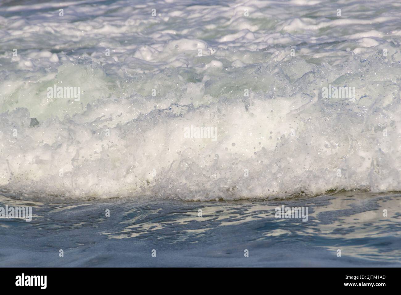 white foam of a wave at leblon beach in Rio de Janeiro Brazil Stock ...