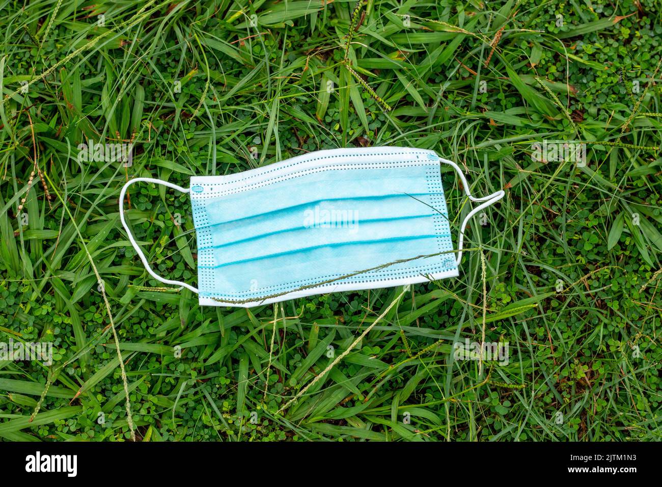 blue disposable protective mask, used for protection against cornavirus ...