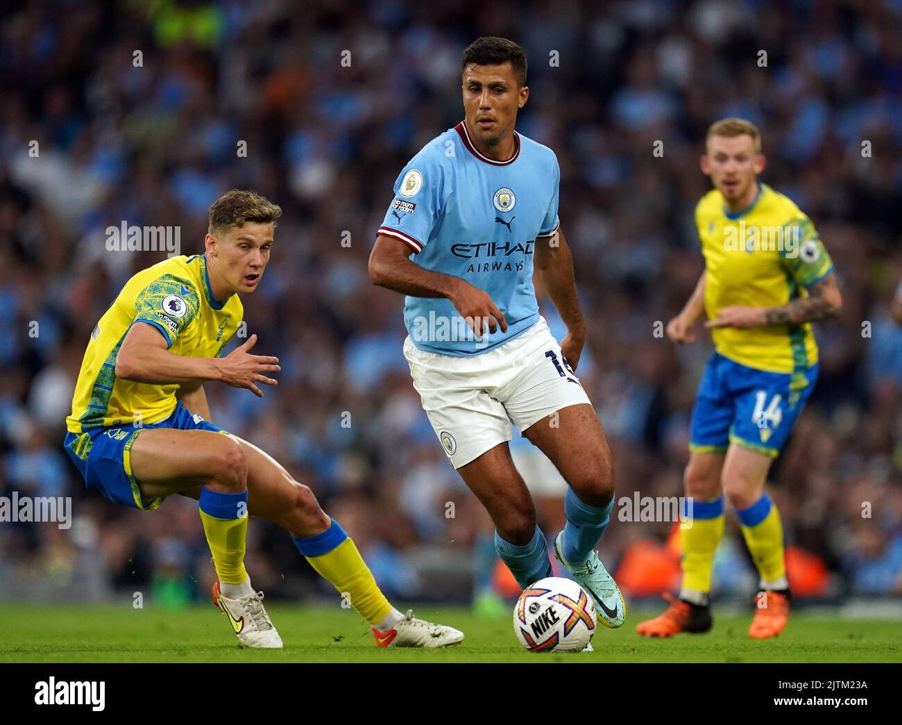 Manchester City's Rodri (centre) in action during the Premier League ...
