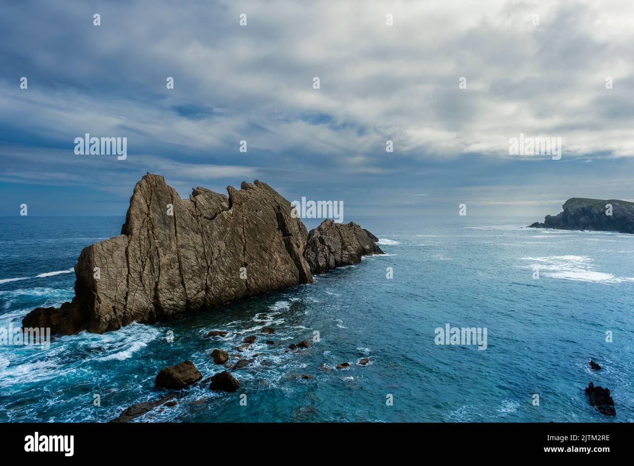 Eroded limestone sea stacks in La Arnia, Costa Quebrada, Cantabria ...