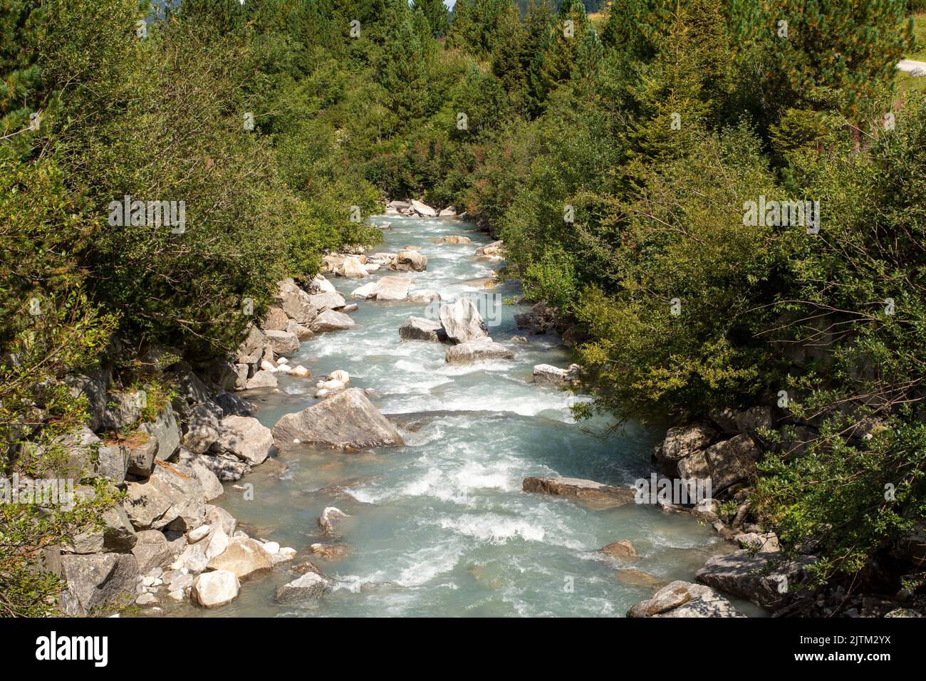 Cristal clear alpine stream with fresh water in the Austrian Alps Stock ...