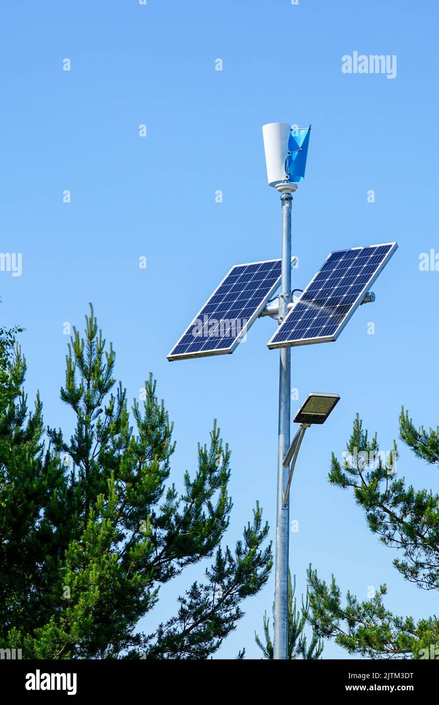 Pole with innovative LED street light powered by solar cells and small ...