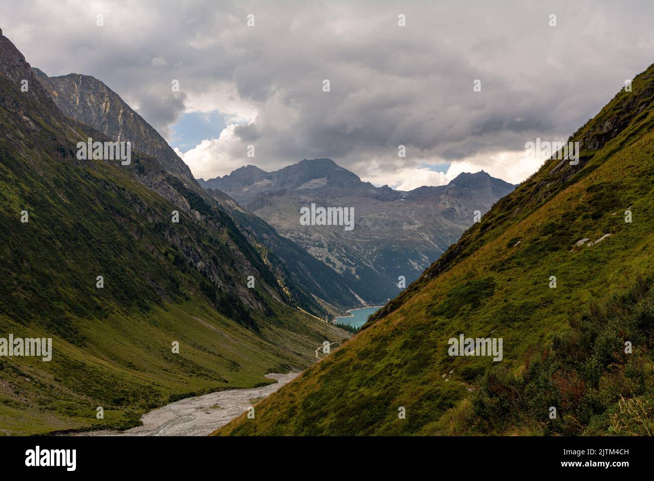 Impressive alpine view of high peaks in summer Stock Photo - Alamy