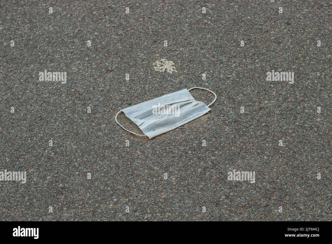 blue disposable protective mask, used for protection against cornavirus ...