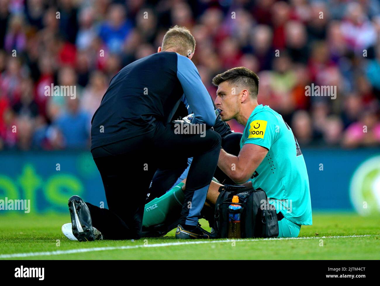 Newcastle United goalkeeper Nick Pope requires medical attention during ...