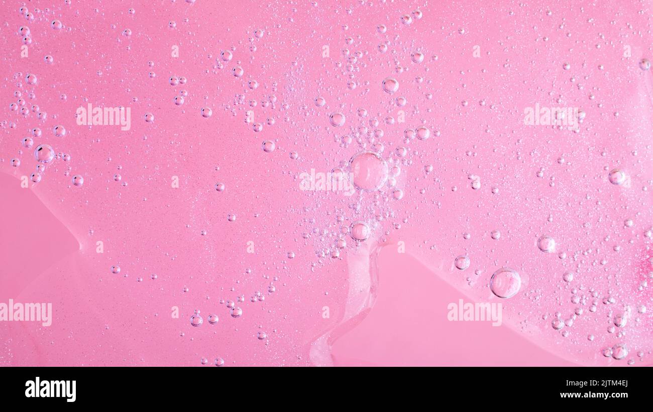 Macro photography of bubbly smear on raspberry pink background,large ...