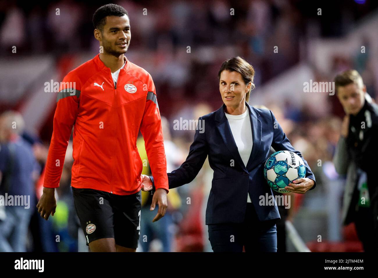 EINDHOVEN, NETHERLANDS - AUGUST 31: Cody Gakpo of PSV and Press Officer ...