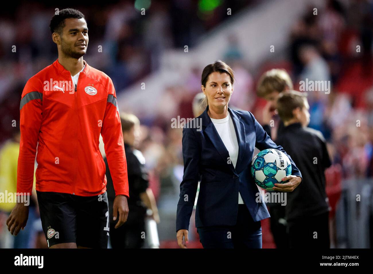 EINDHOVEN, NETHERLANDS - AUGUST 31: Cody Gakpo of PSV and Press Officer ...