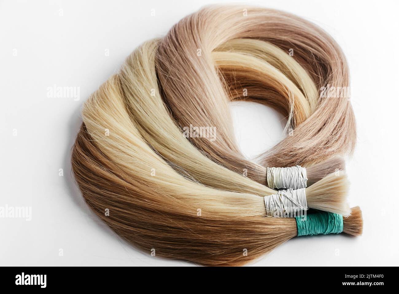Curved hair samples for extension rolled up,different colors.White ...