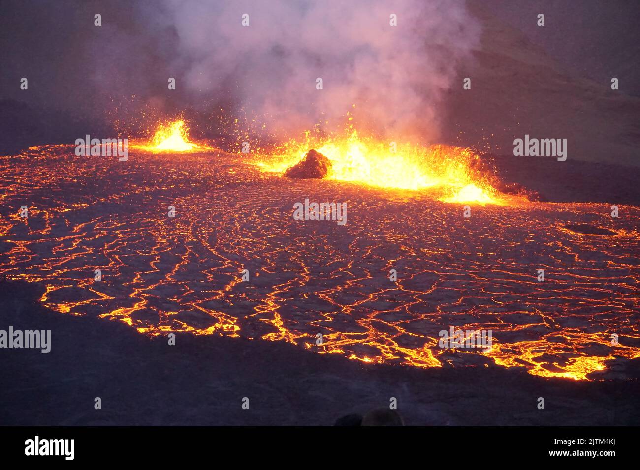 An aerial view of the Fagradalsfiall volcano eruption and hot lava on ...