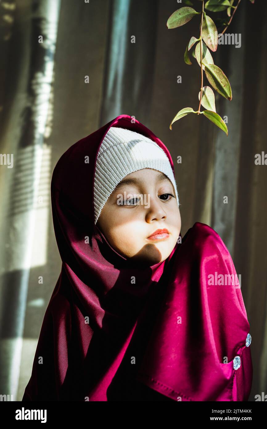 A portrait of a beautiful Muslim toddler girl with hijab Stock Photo ...