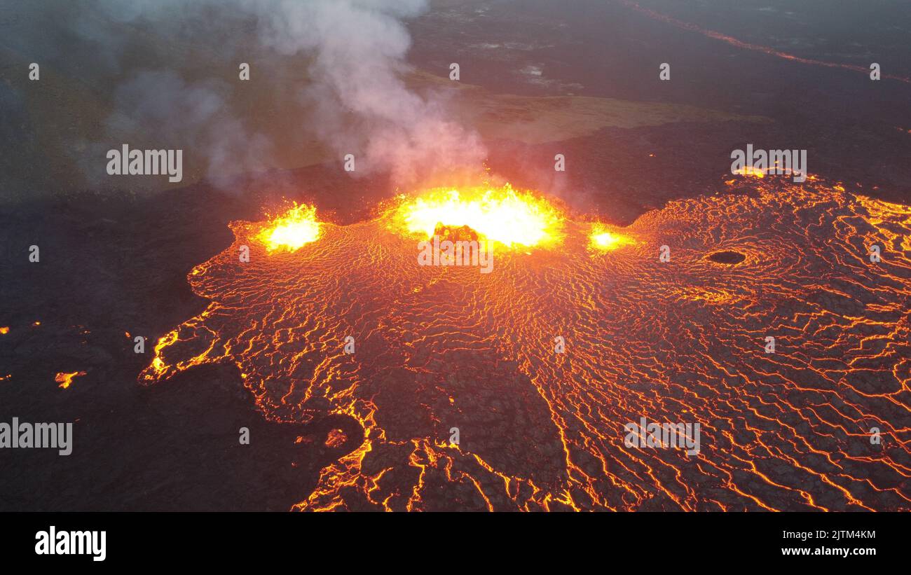 An aerial view of the Fagradalsfiall volcano eruption and hot lava on ...
