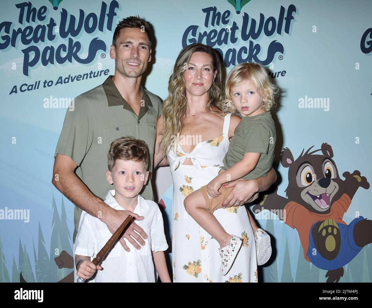 Andrew Walker, Cassandra Walker, West Walker and Wolf Walker arriving ...