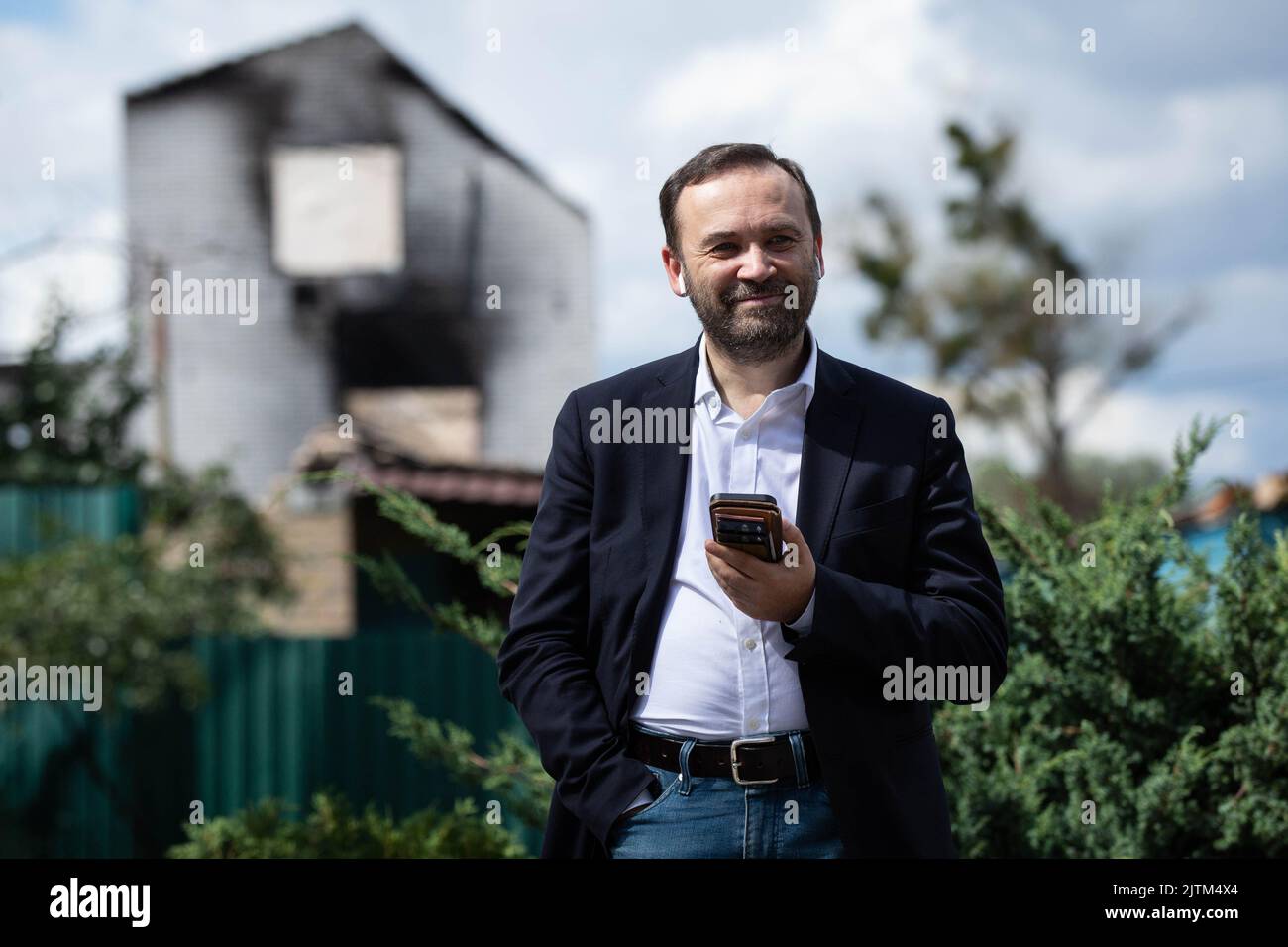 Ex-deputy of Russia's Duma Ilya Ponomarev speaks on phone before ...