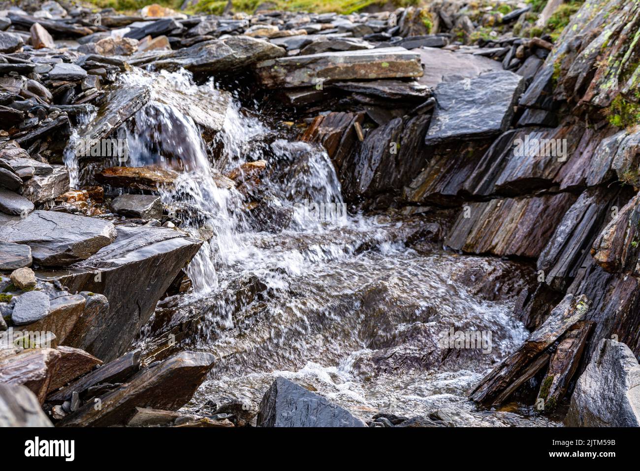 Cristal clear alpine stream with fresh water in the Austrian Alps Stock ...