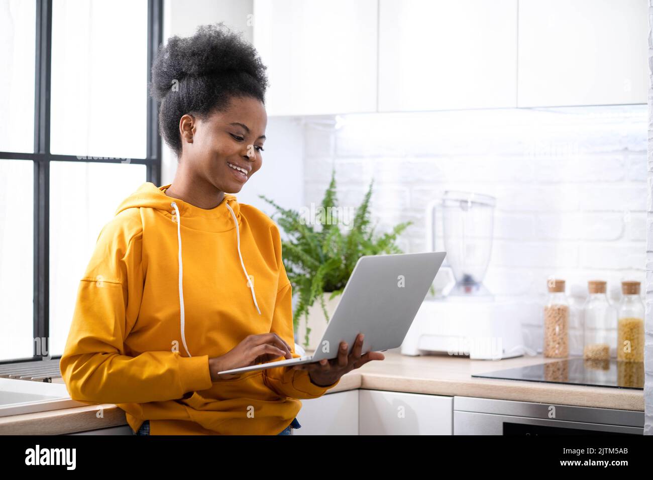 Happy attractive african american girl working office work remotely ...