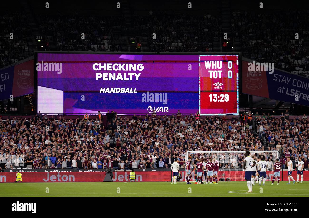 The LED screen announces a VAR check for a possible penalty during the ...