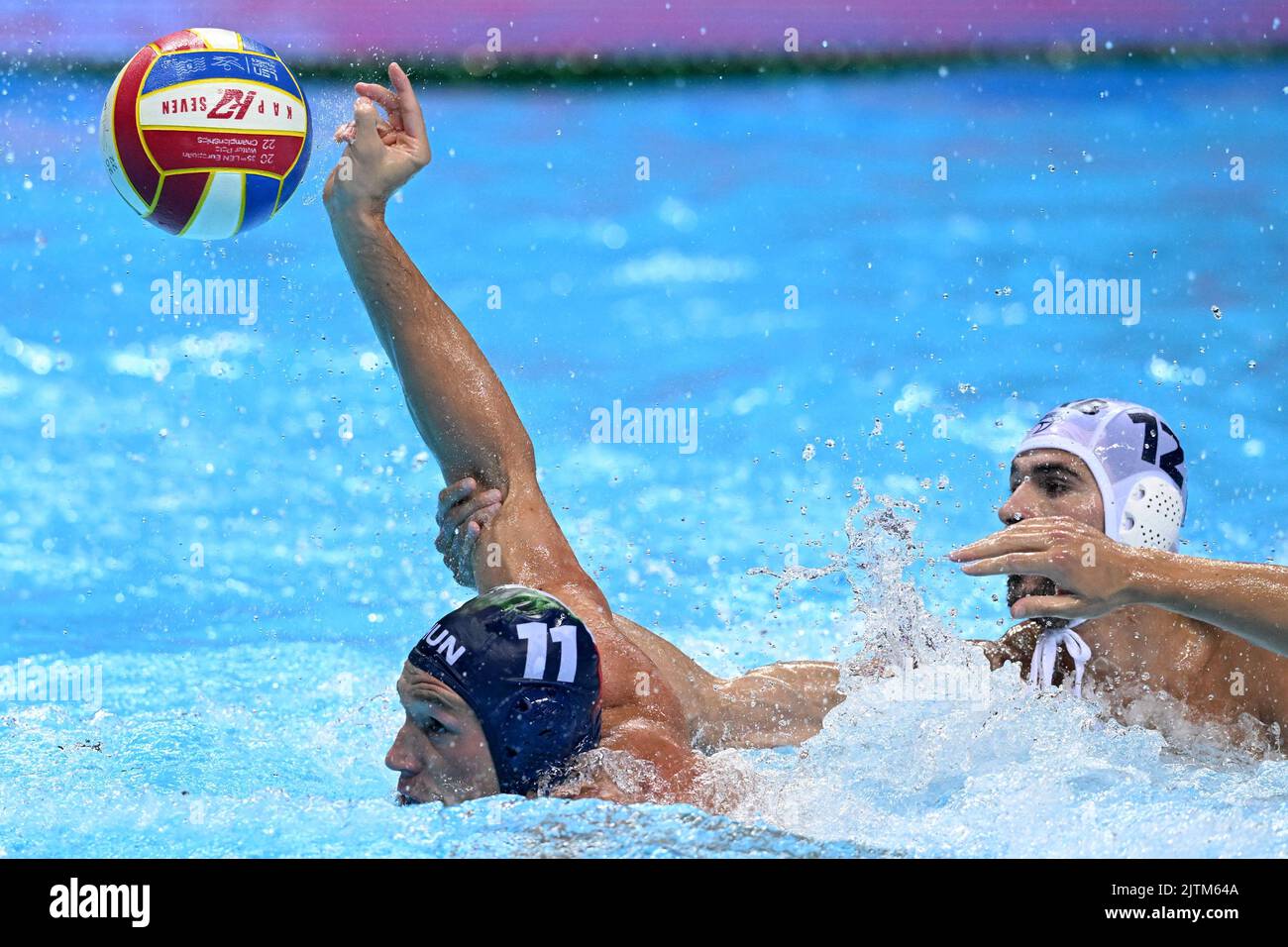 SPLIT, CROATIA - AUGUST 31: Szilard Jansik of Hungary is challenged by ...