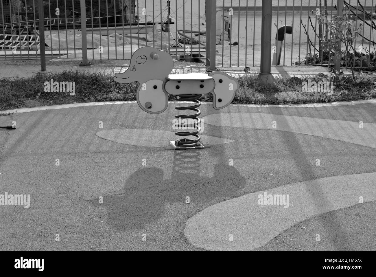 animal spring rider in a playground Stock Photo - Alamy