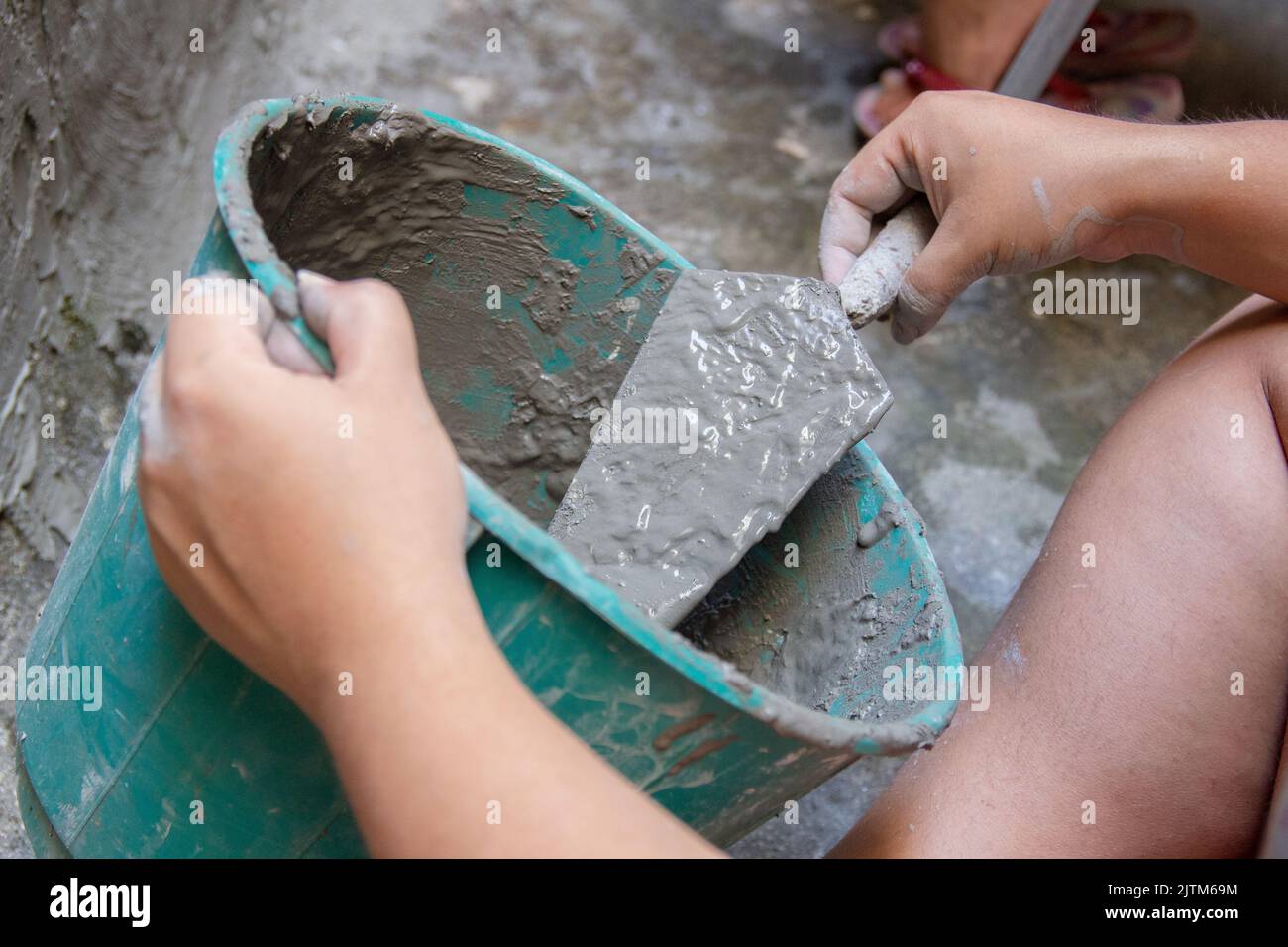 Cement in a bucket hi-res stock photography and images - Alamy