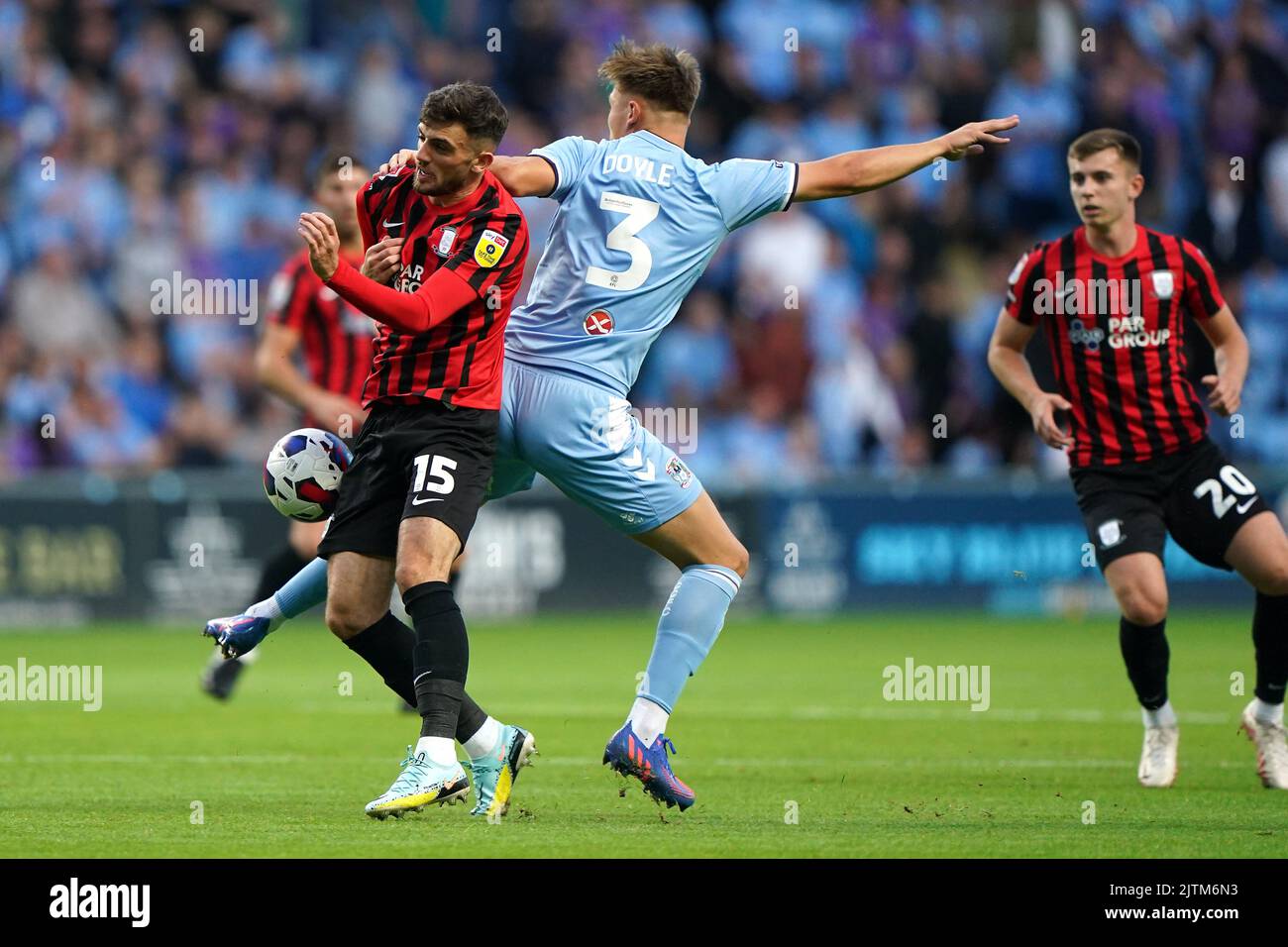 Preston North End's Troy Parrott (left) and Coventry City's Callum ...