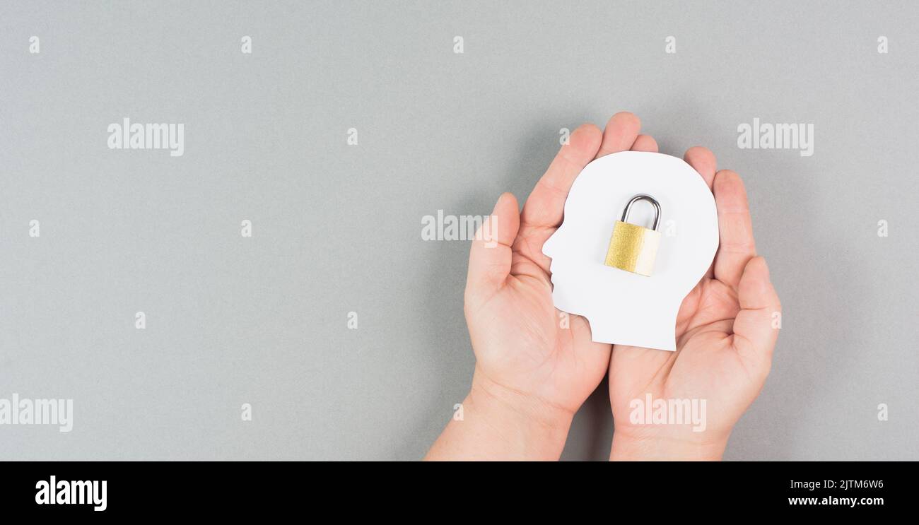 Silhouette of a head with a lock, lockout from computer cloud, safety ...