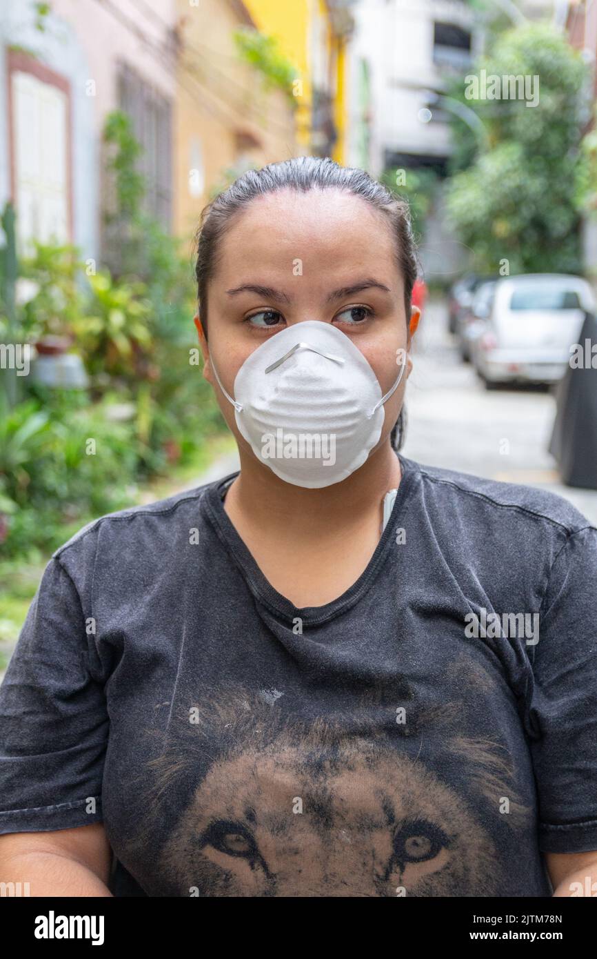 white woman with mask on her face to protect herself from the ...