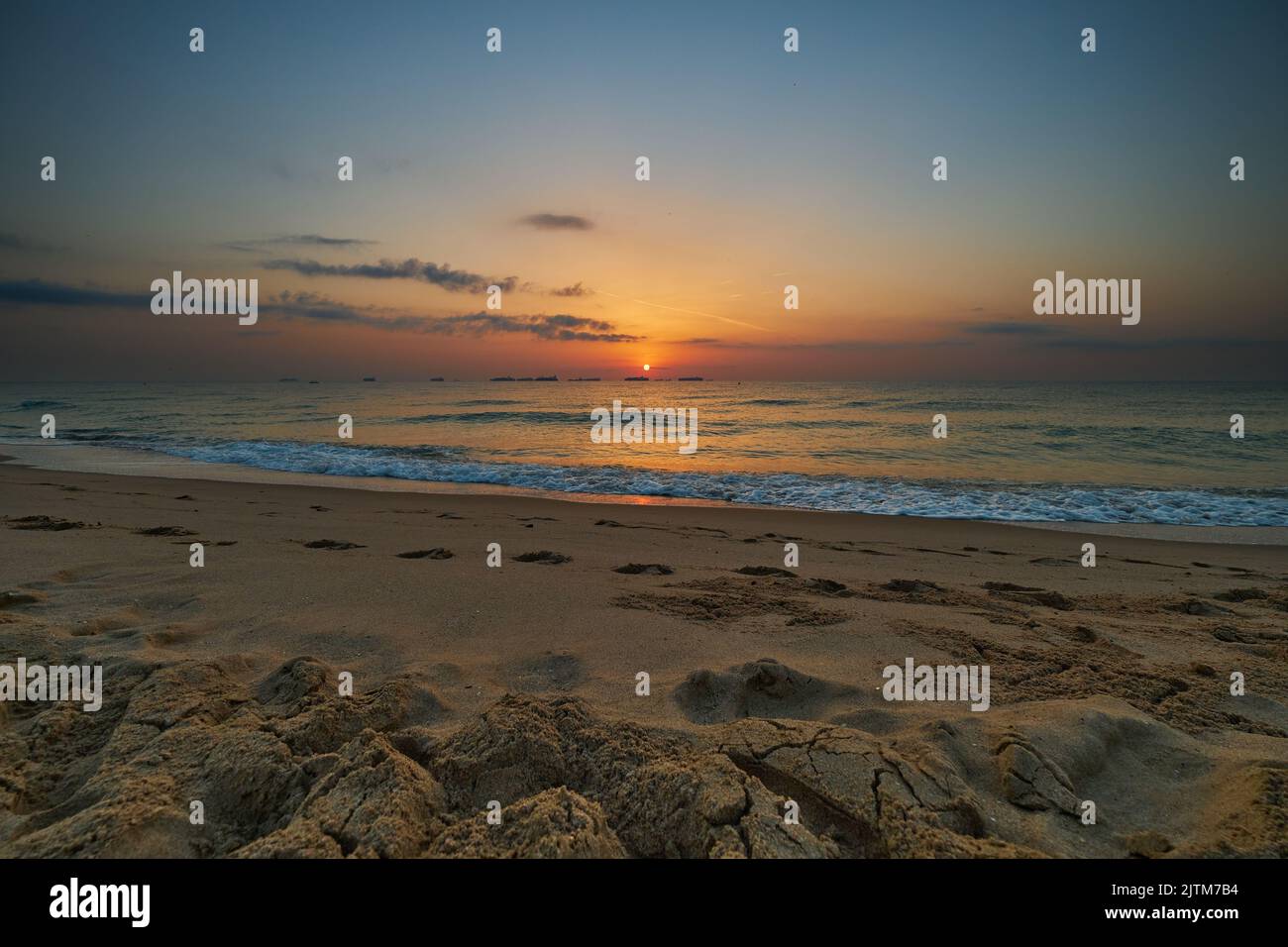 beautiful sunrise on a calm sea Stock Photo - Alamy